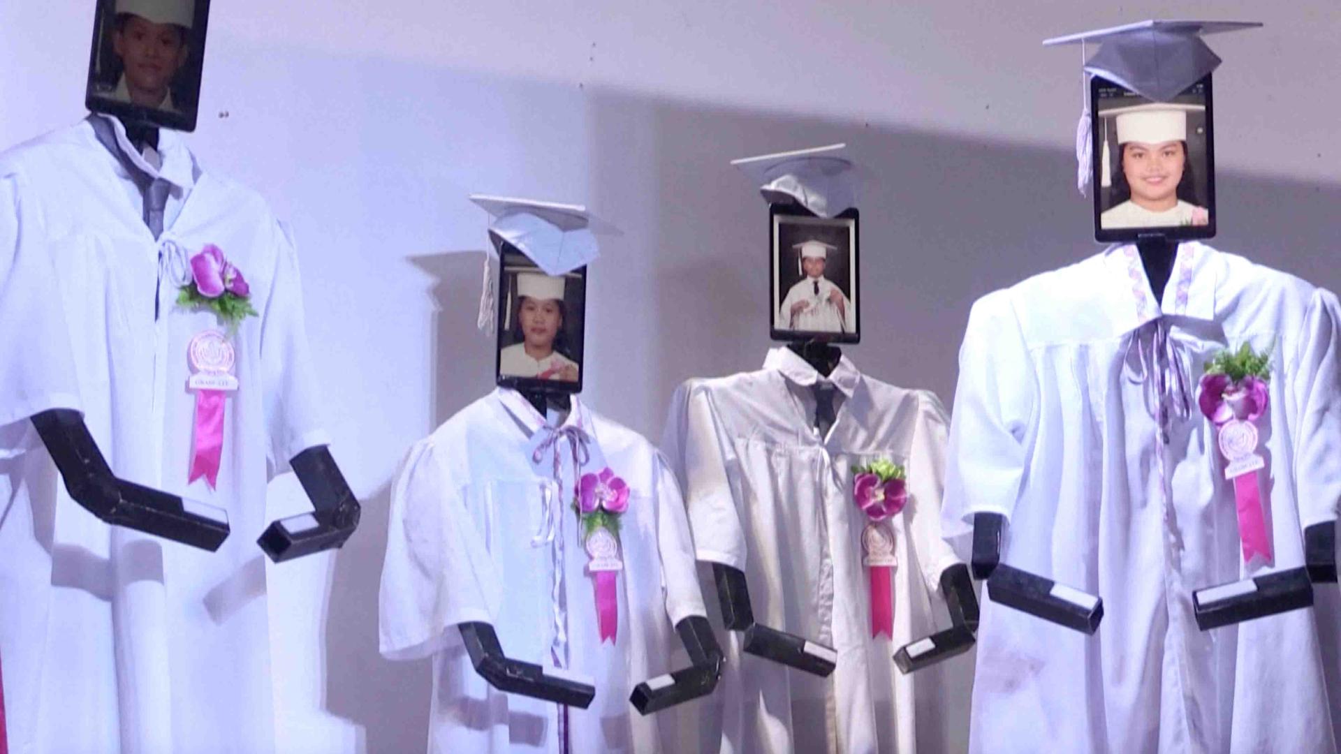 Robots stand in for graduates at Philippine 'cyber-graduation' - CGTN