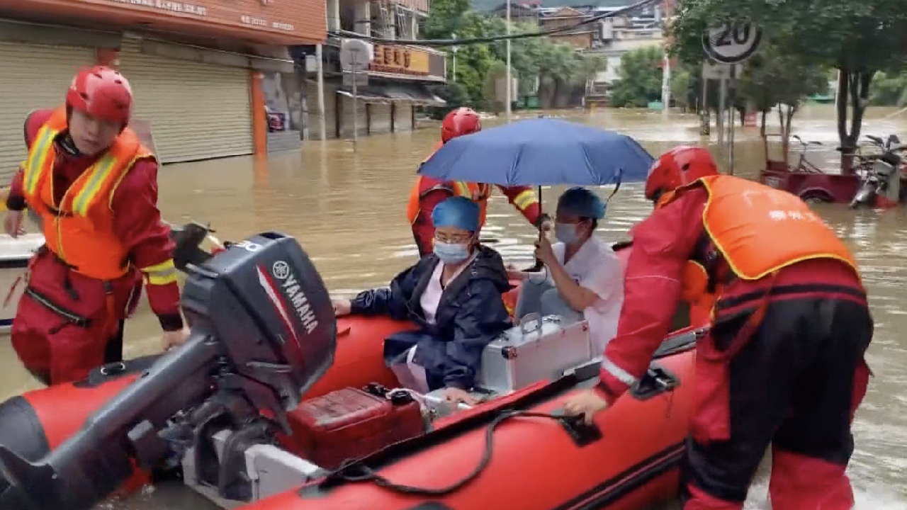 Flood-stranded pregnant woman transferred to hospital in south China - CGTN