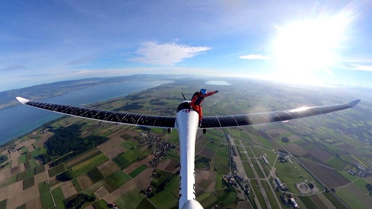 Swiss team claims first jump, free fall from solar plane - CGTN
