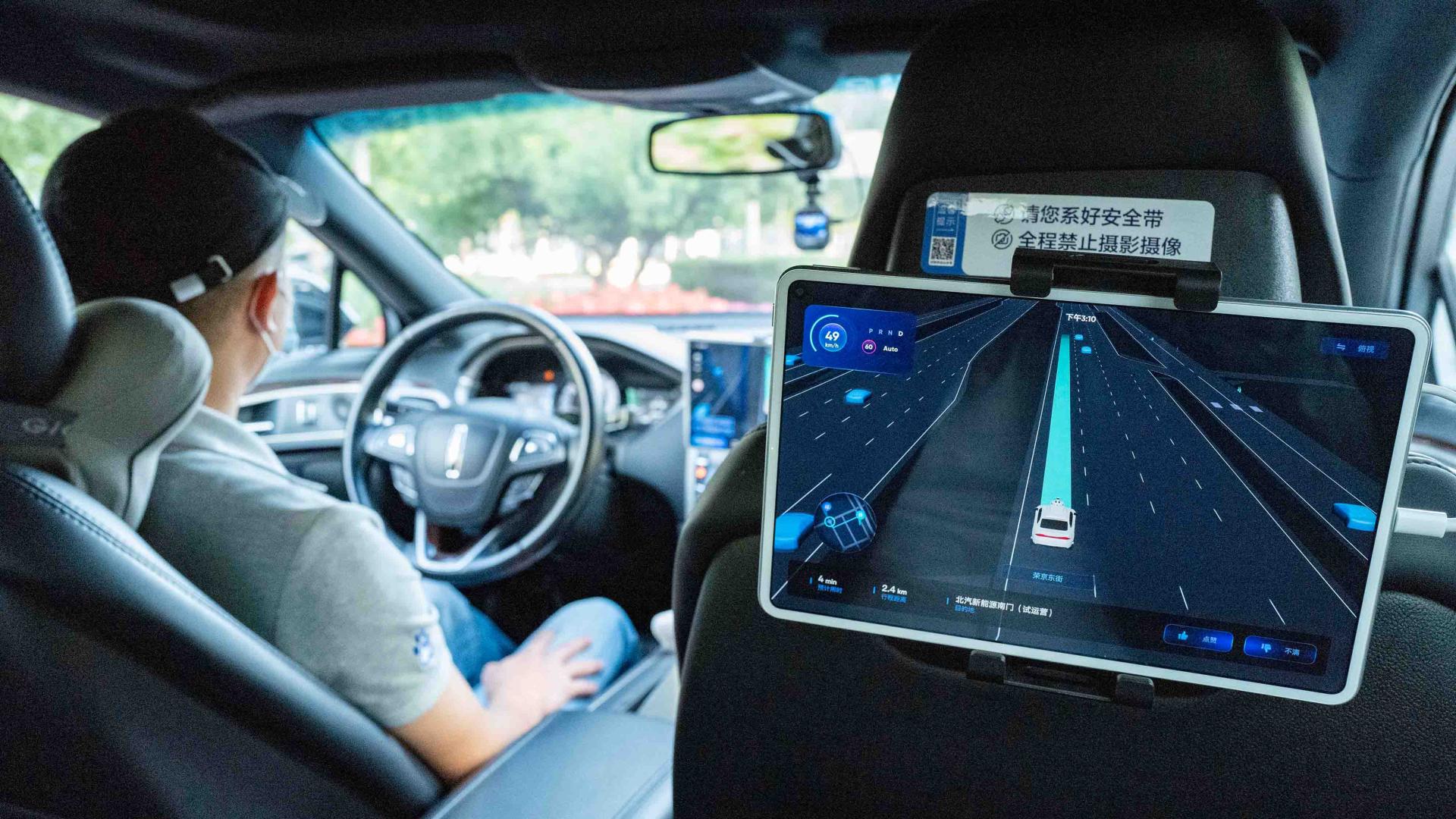 Beijing launches robot taxi service with free rides - CGTN