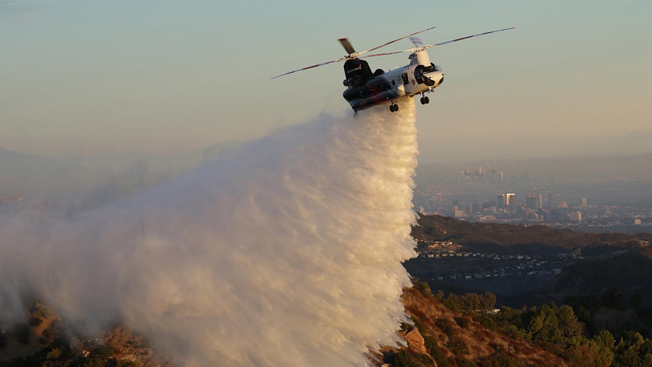 Fire crews use helicopters to try to tame California wildfire - CGTN