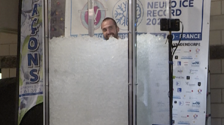 Up to his neck in it: 'Ice man' sets immersion world record in France ...