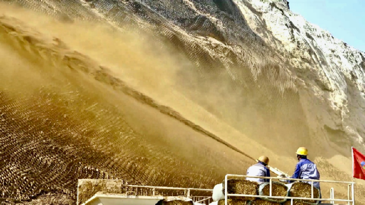 'Soil spraying' technique turns barren mountains green in N China - CGTN