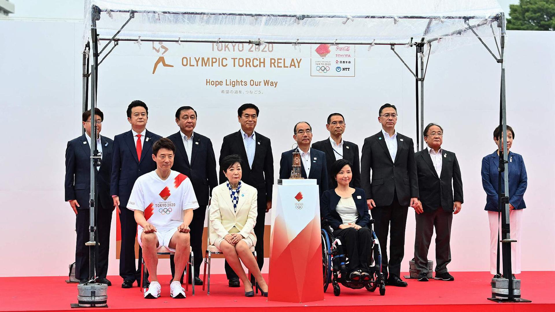 Tokyo 2020 Torch relay reaches host city hit by fresh COVID-19 surge - CGTN