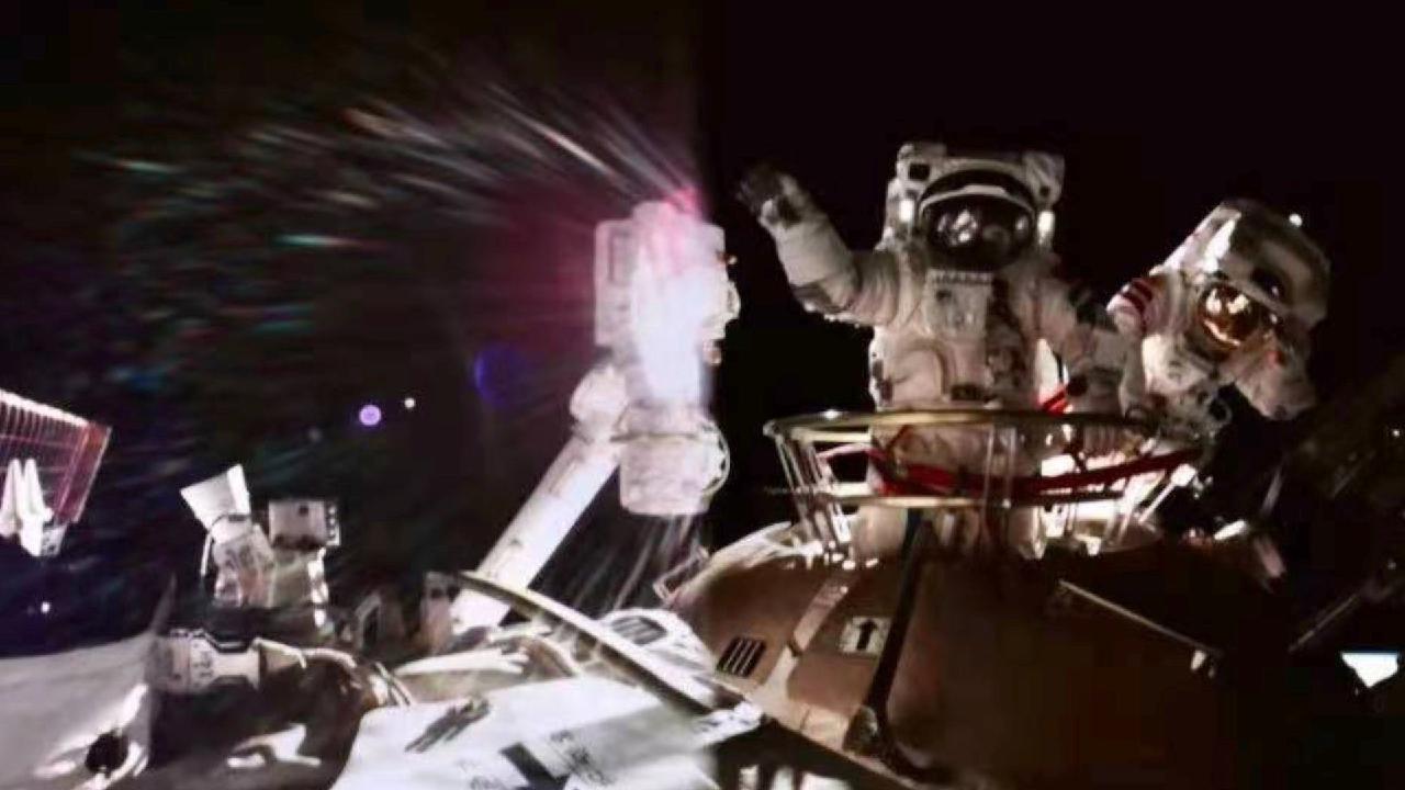 Chinese astronauts complete second round of spacewalk - CGTN