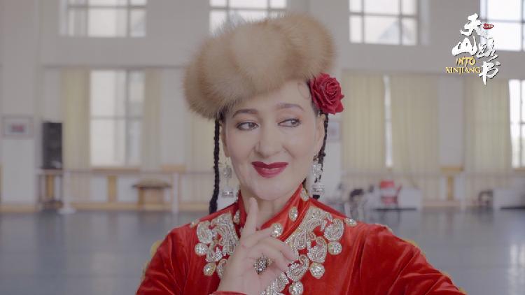 Into Xinjiang: One on one the Muqam Art Troupe's lead dancer - CGTN