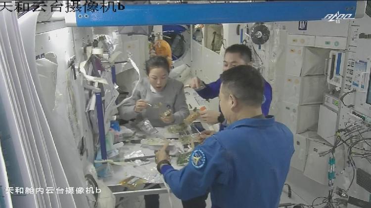 Space Log: New footage shows Chinese astronauts dining in space - CGTN