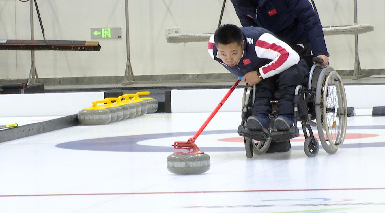 Chinese wheelchair curling team hopes for another Paralympic medal - CGTN