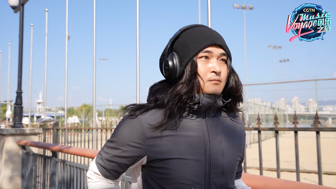 EDM artist 'Mico' pumps up energy for Olympic relay tune - CGTN