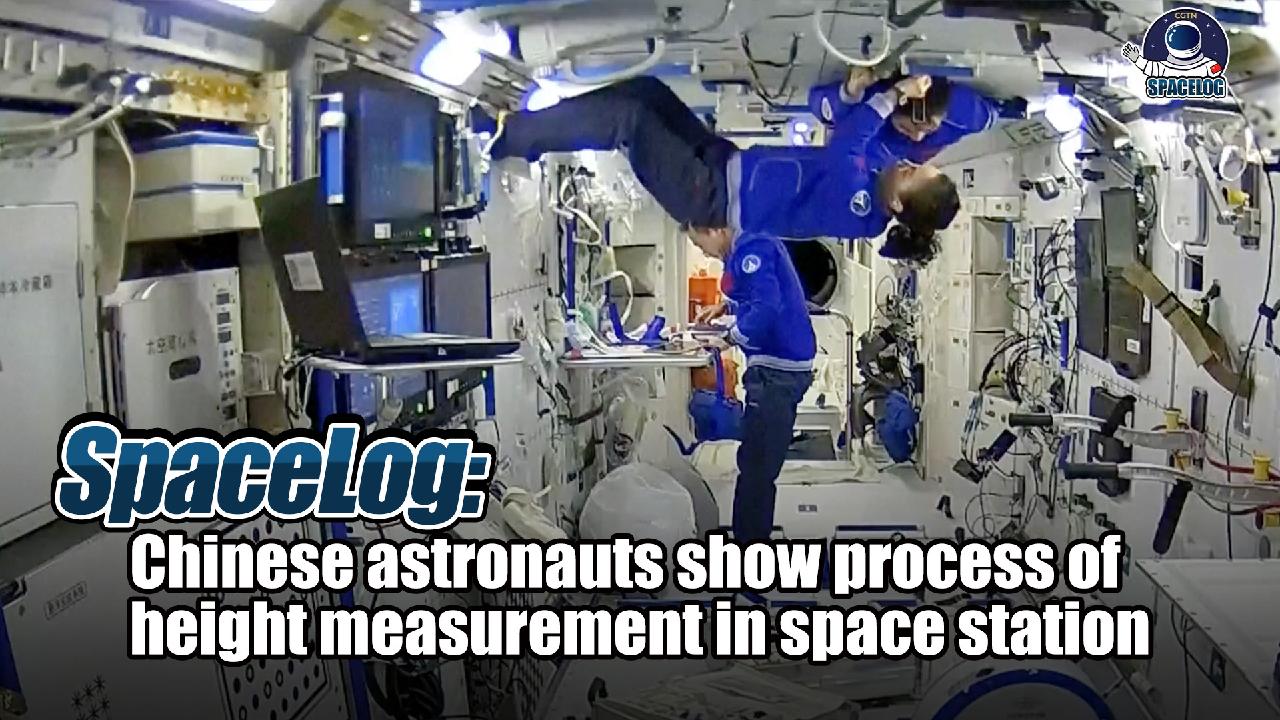 Chinese astronauts measure their height in space station - CGTN