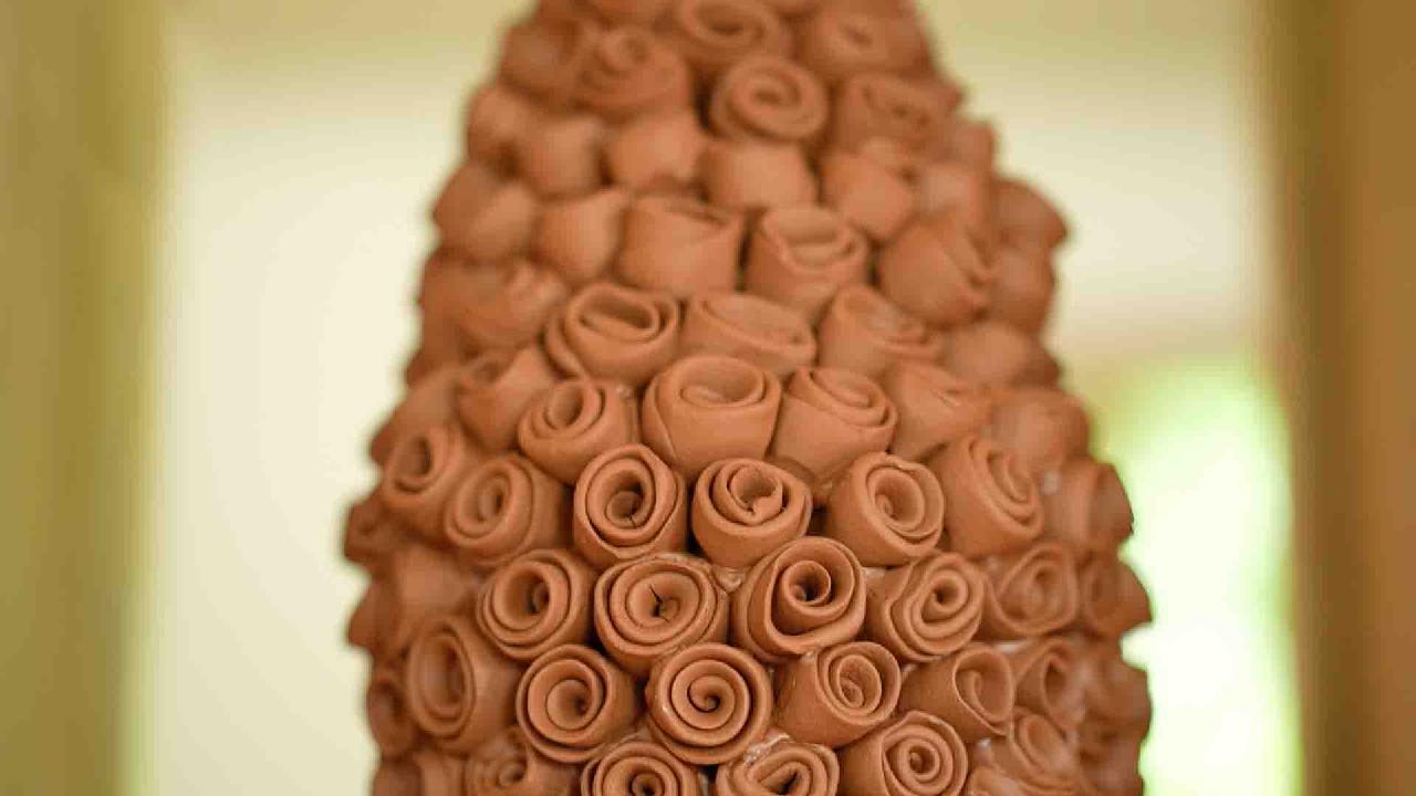 'Purple clay' helps revive Li ethnic culture in Hainan - CGTN