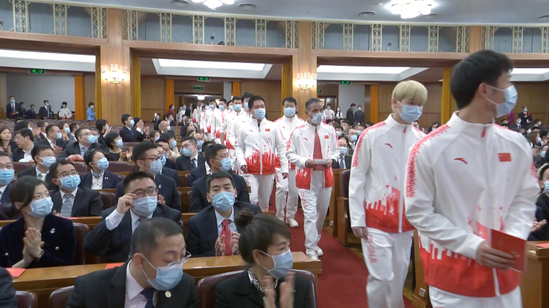 Warm welcome for athletes at event honoring Beijing 2022 role models - CGTN