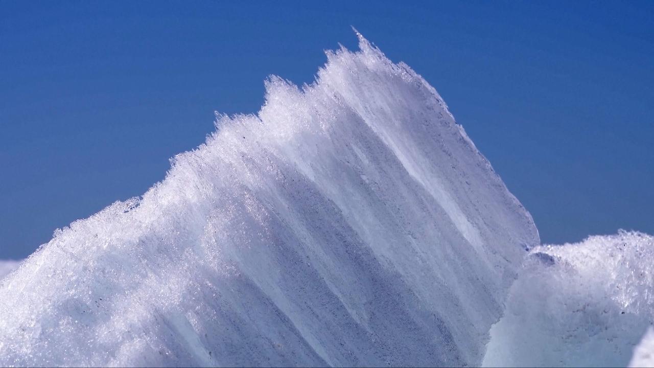Wind-sculpted ice an awe-inspiring scene in Xinjiang - CGTN