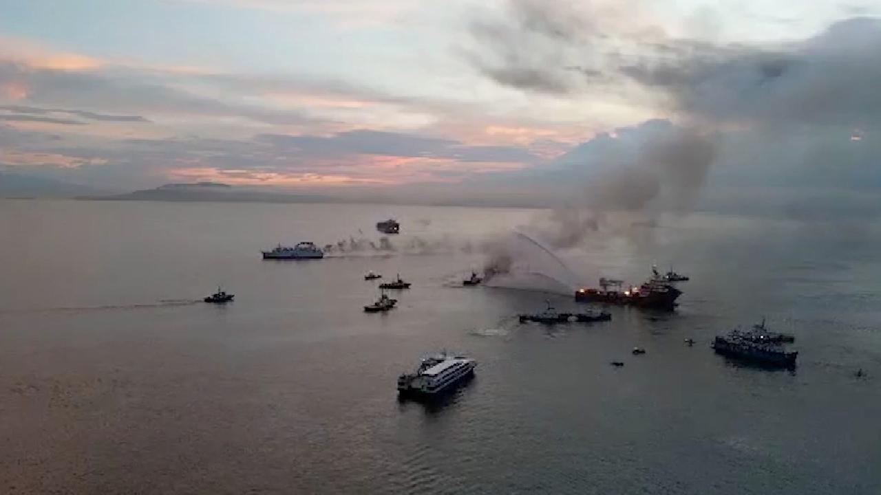 Philippine ferry with 82 people onboard catches fire, 1 injured - CGTN
