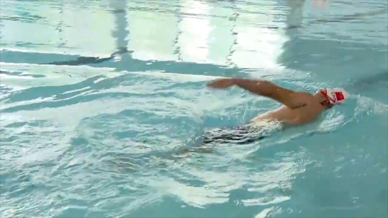 Disabled rescuer saves people from river, wins swimming medals - CGTN