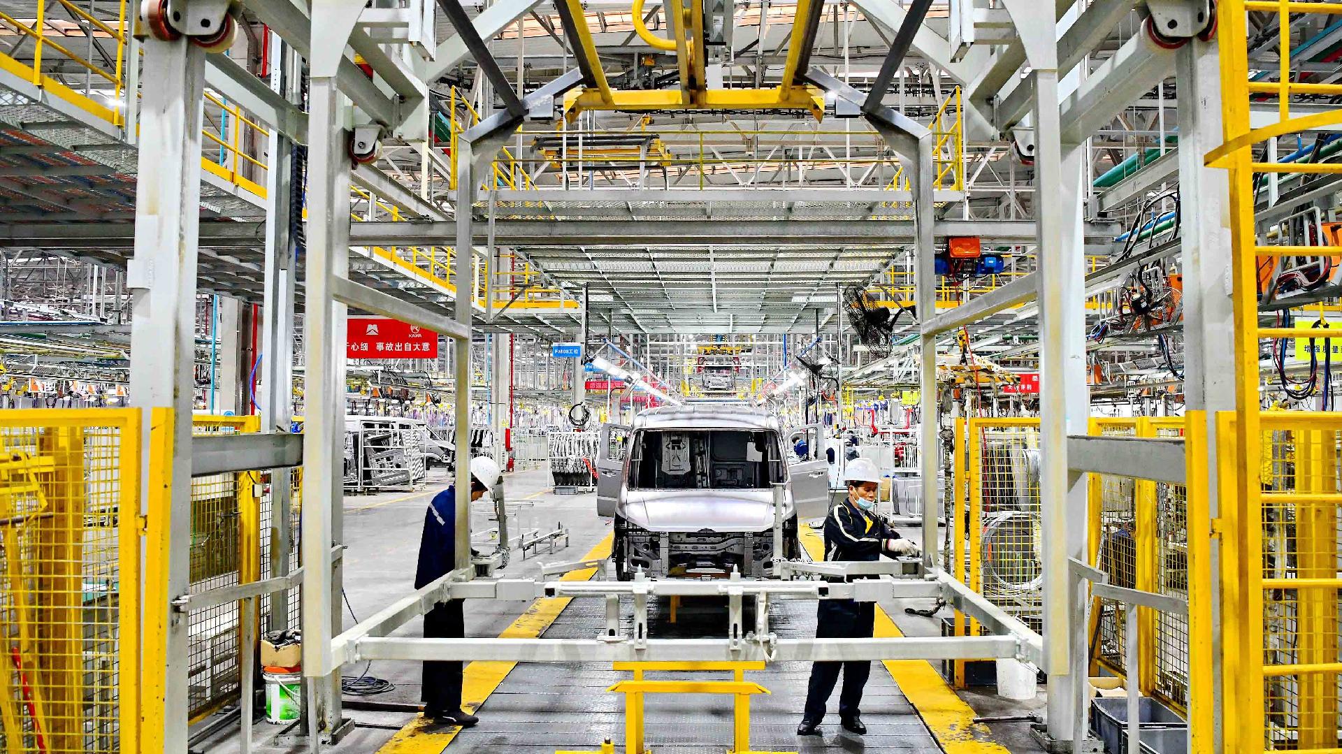 China's NEV production, sales top the world - CGTN