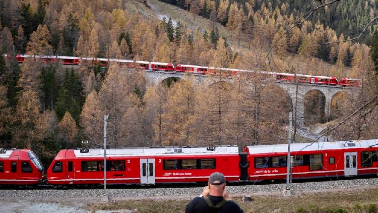 World's longest passenger train runs through Swiss Alps - CGTN