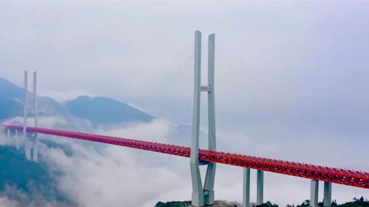 Bridge in SW China rises 200 stories above river - CGTN