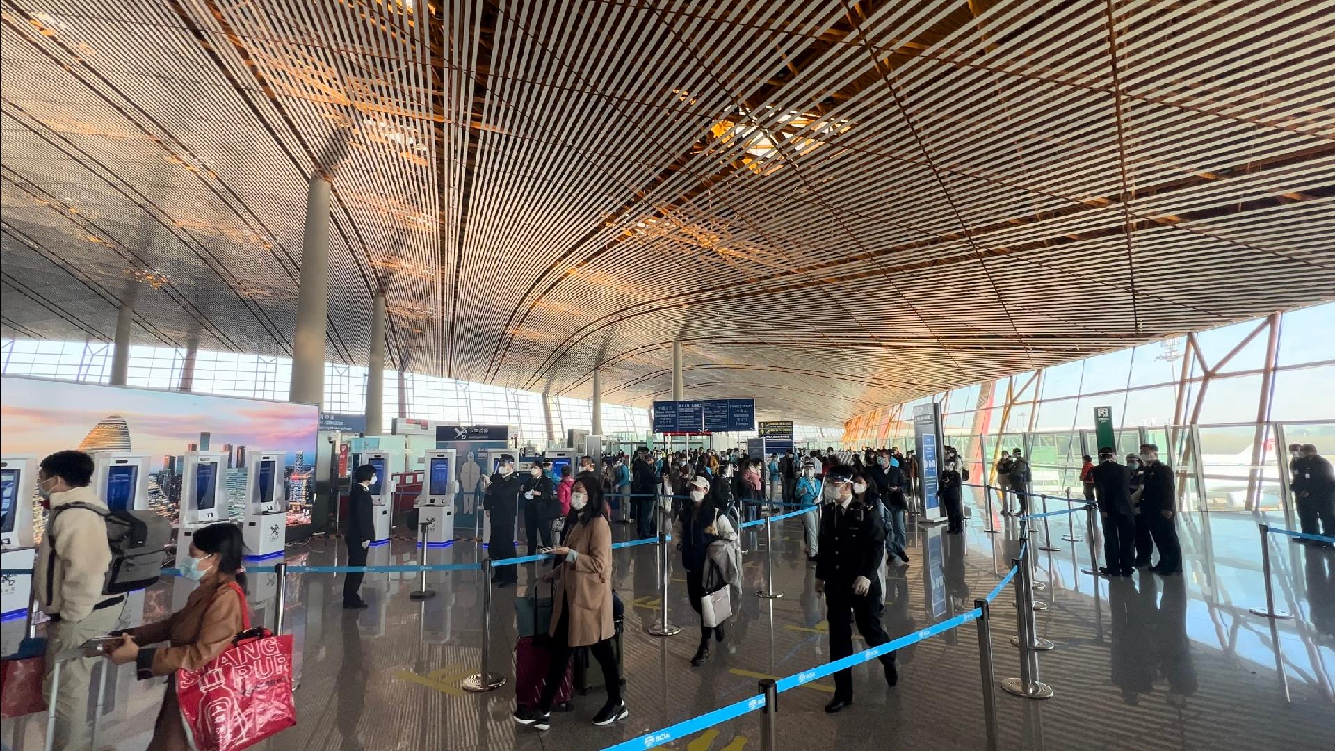 Airport welcomes first inbound flights as China eases COVID-19 curbs - CGTN