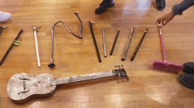 Making musical instruments from discarded materials - CGTN