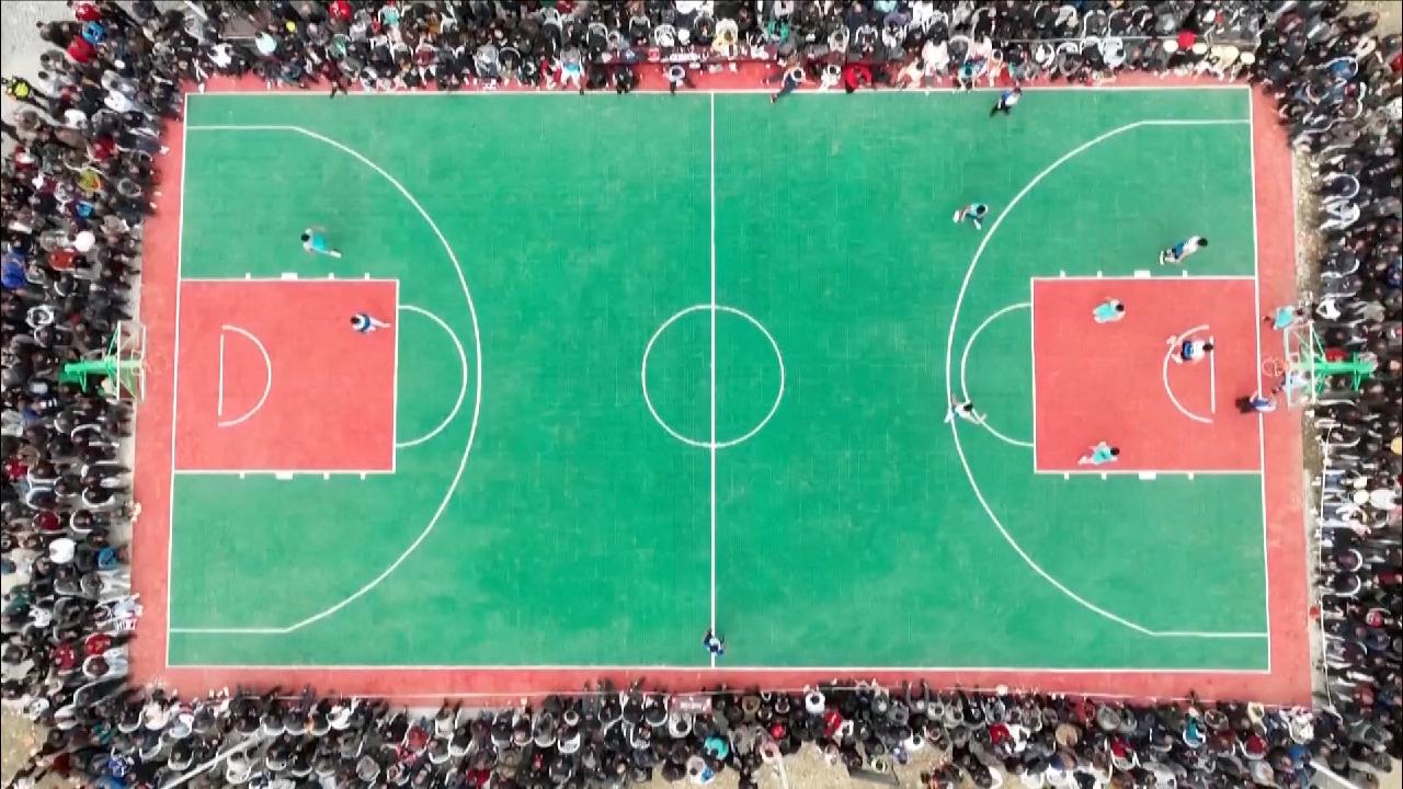 Rural basketball tournament held amid blooming rapeseed - CGTN