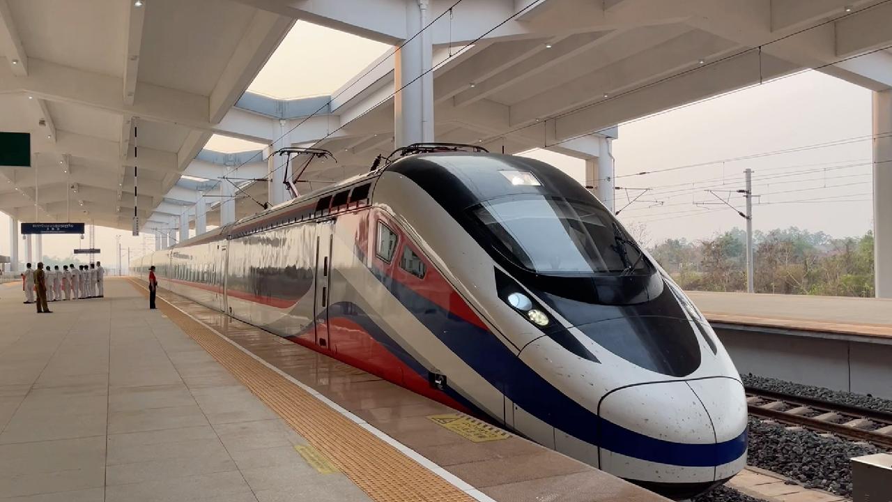Passengers and staff on first China-Laos Railway passenger train - CGTN