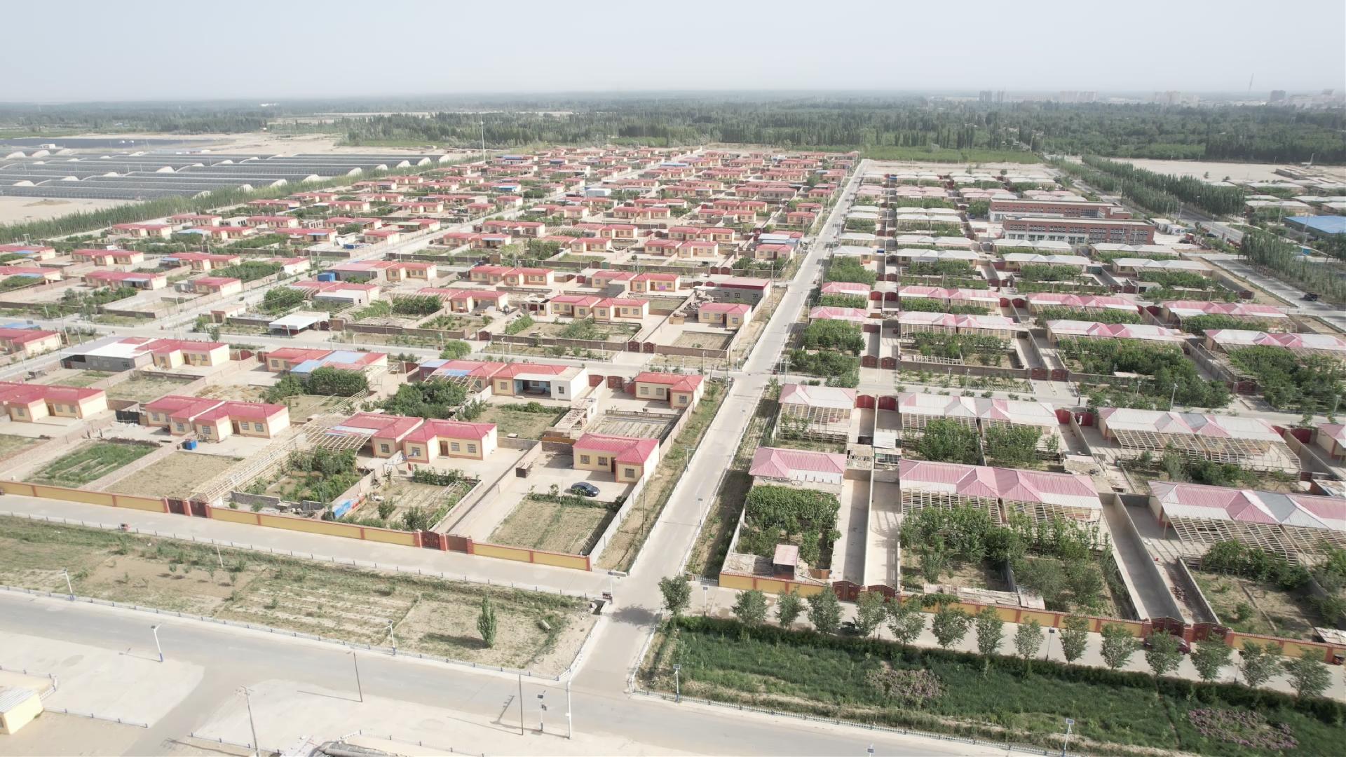 Relocated village in Xinjiang develops with support from Tianjin - CGTN