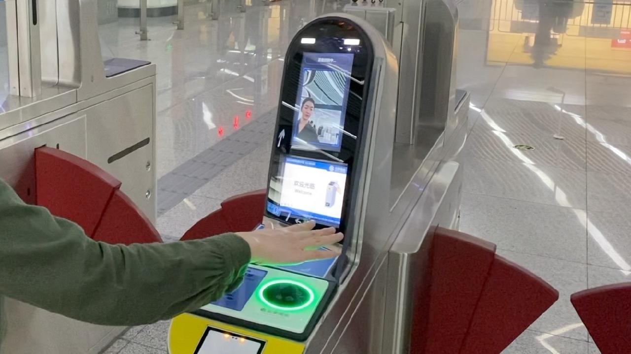 Experiencing new 'Palm Payment' tech on Beijing subway - CGTN