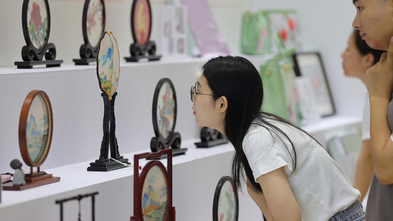 Intangible cultural heritage exhibits shine at cultural fair - CGTN