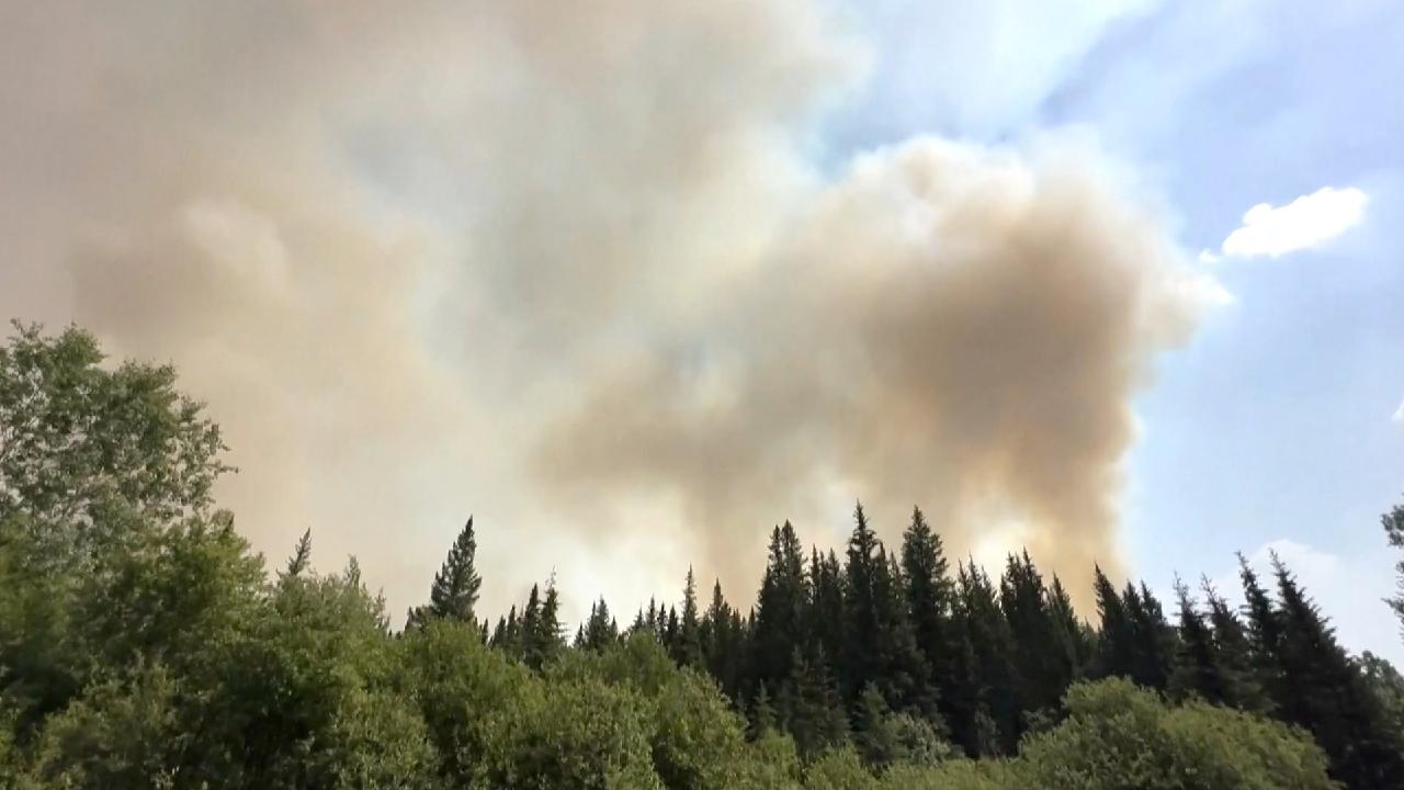 Wildfires sweep across 77,000 sq km of land in Canada - CGTN