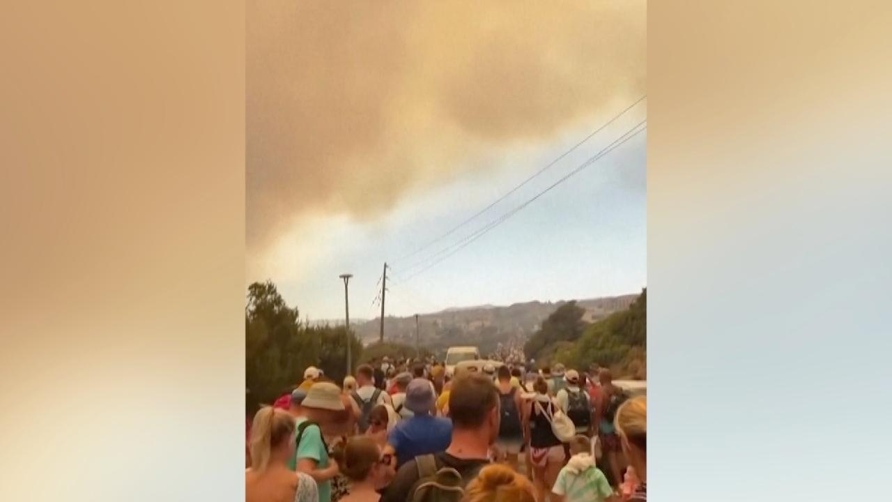 Thousands moved to safety as wildfires rage on Greek island of Rhodes ...