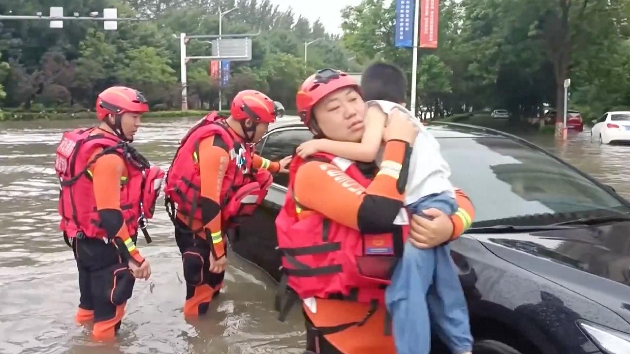Heart-warming moments of rescue operations in flood-hit N China - CGTN