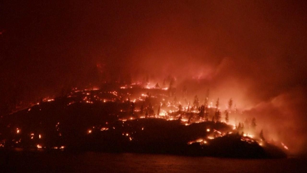 Residents urged to flee as wildfires spread in Canada's NWT and BC - CGTN