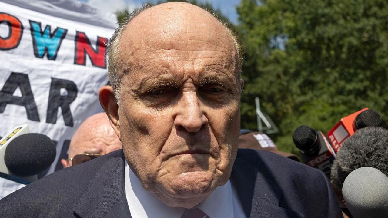 Trump lawyer, ex-NYC mayor surrenders in Georgia, bond set at $150,000 ...