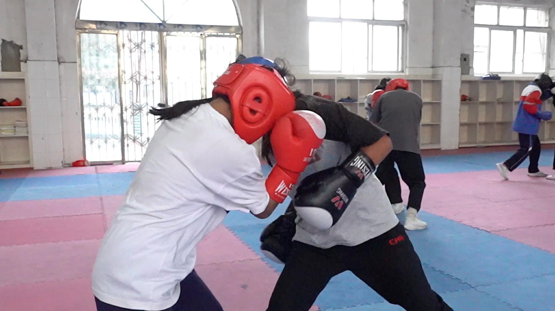 Fighting for the future: Boxing team helps students dream big - CGTN