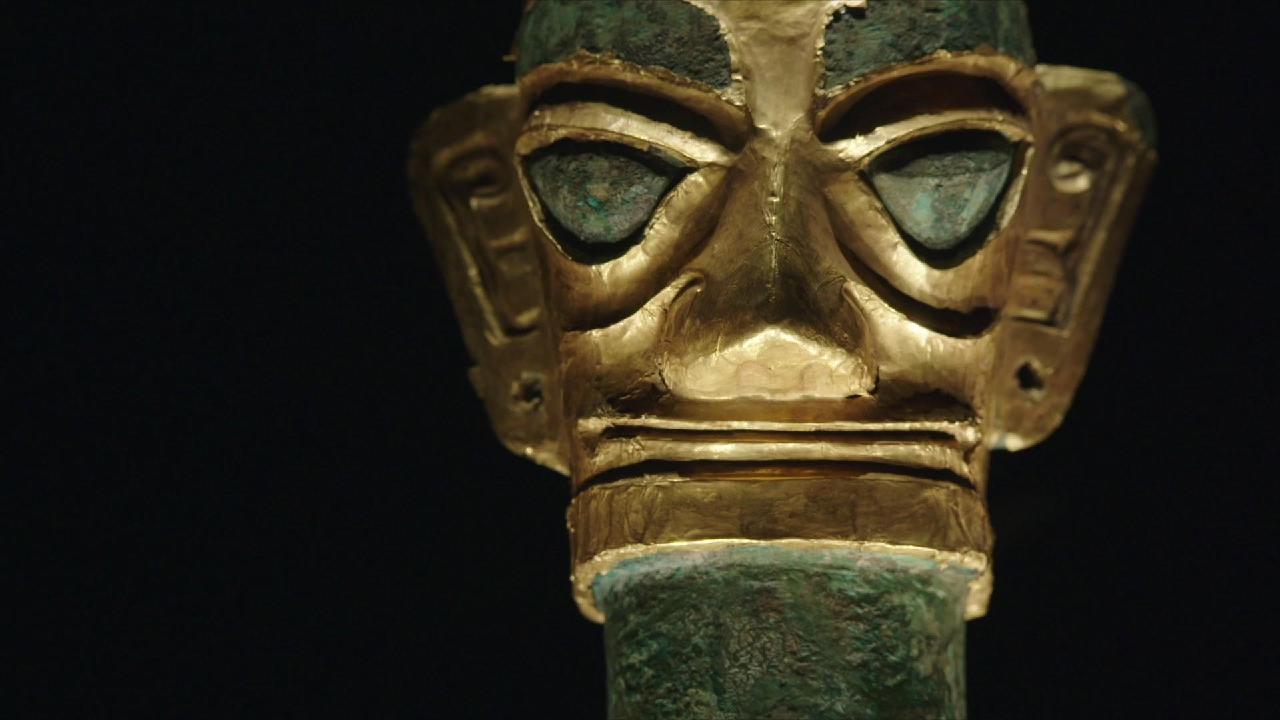 Treasures and Masks: Bronze human head with gold mask - CGTN