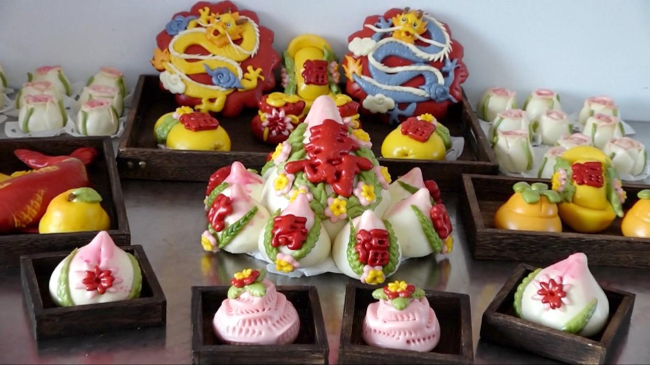 People in Shandong, Shanxi make steamed buns for Xiaonian Festival - CGTN