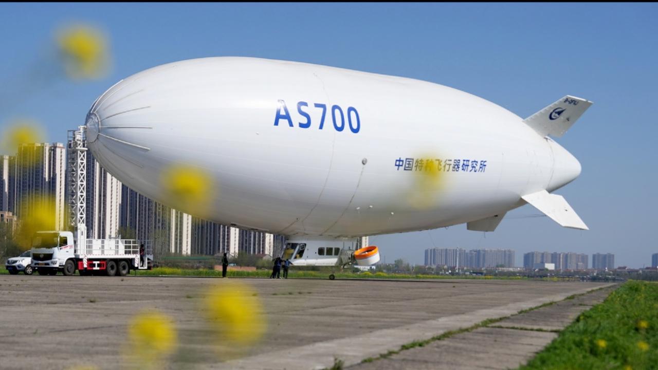 Chinese airship AS700 completes maiden trial flight - CGTN