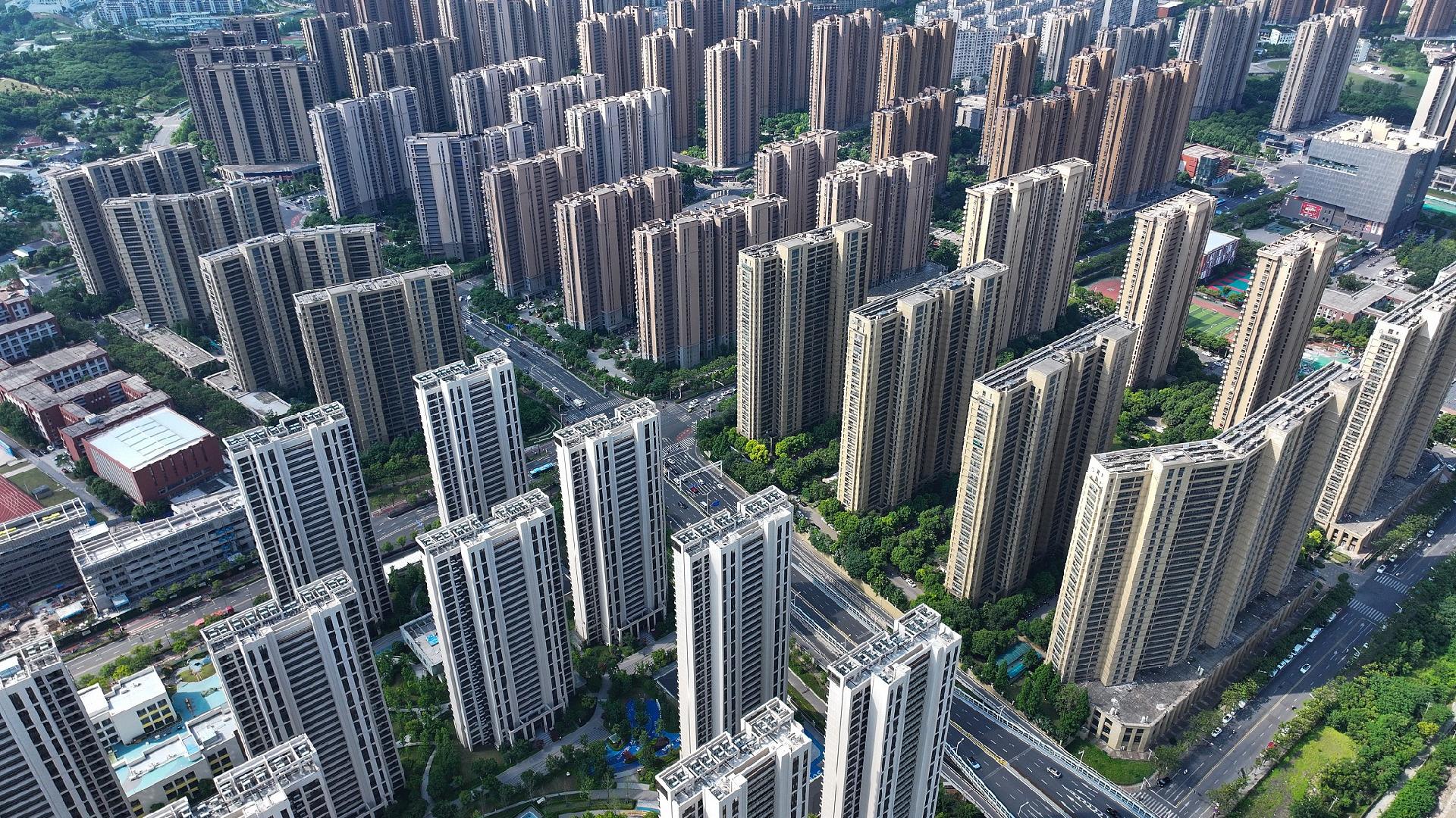 Analyst: China's new real estate policies help reduce buyers' burdens ...
