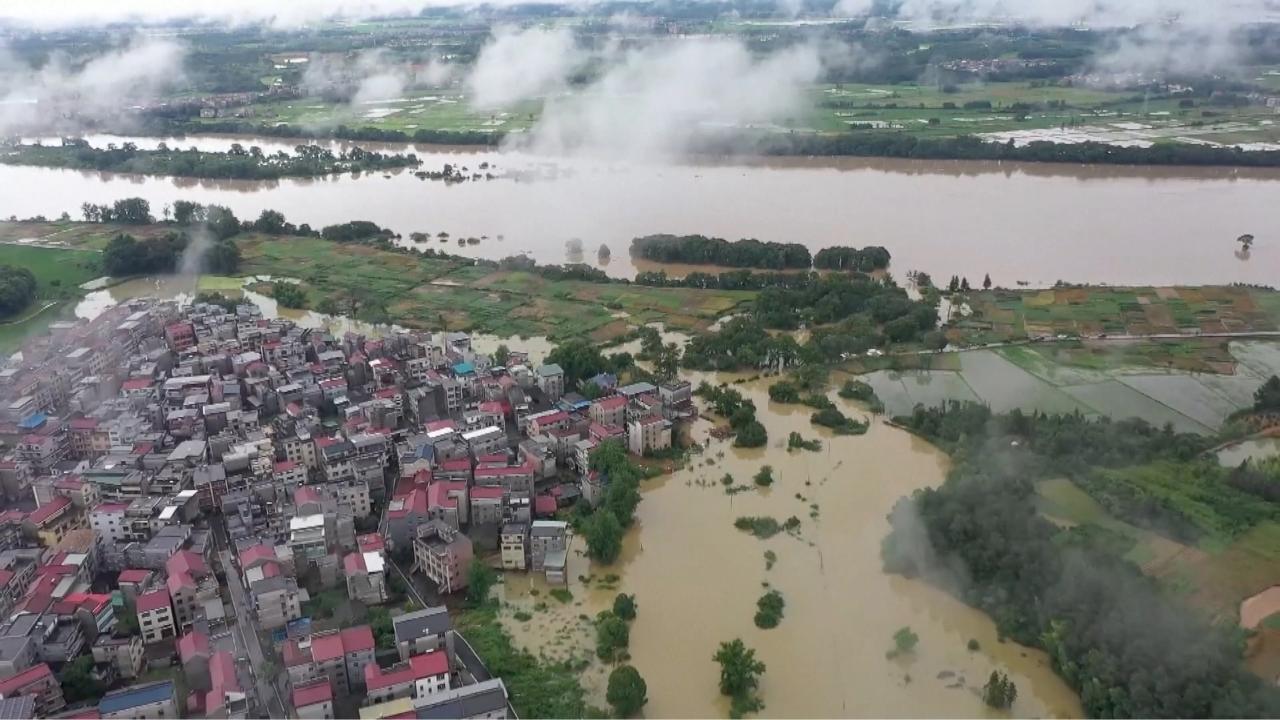 China ramps up efforts as surging rivers threaten more areas - CGTN