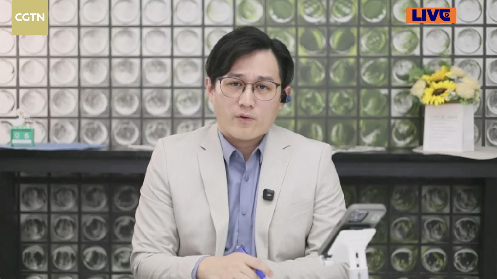 Macao's election committee member shares insights on Two Sessions - CGTN