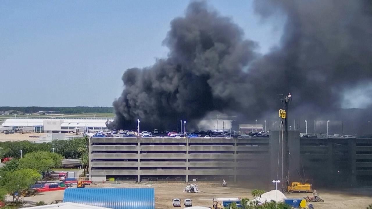 Florida airport closes after vehicle catches fire in parking garage ...