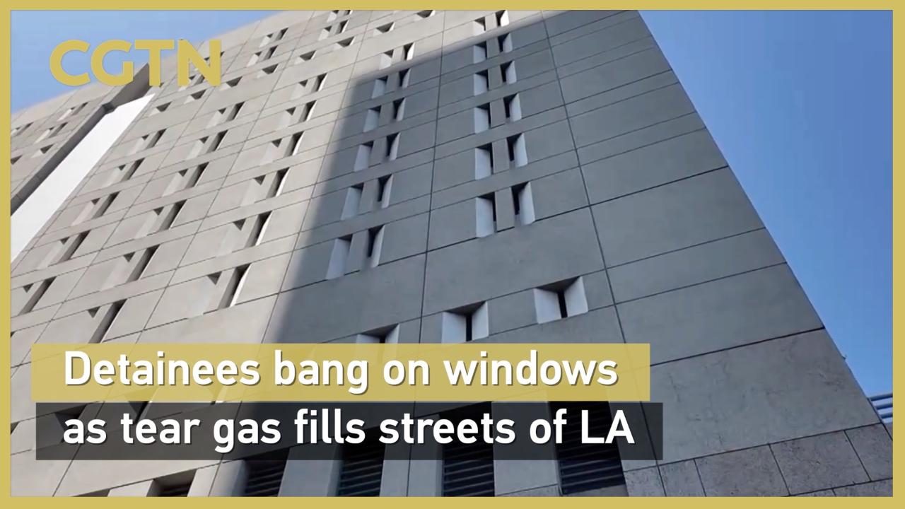 Detainees bang on windows as tear gas fills streets of LA - CGTN