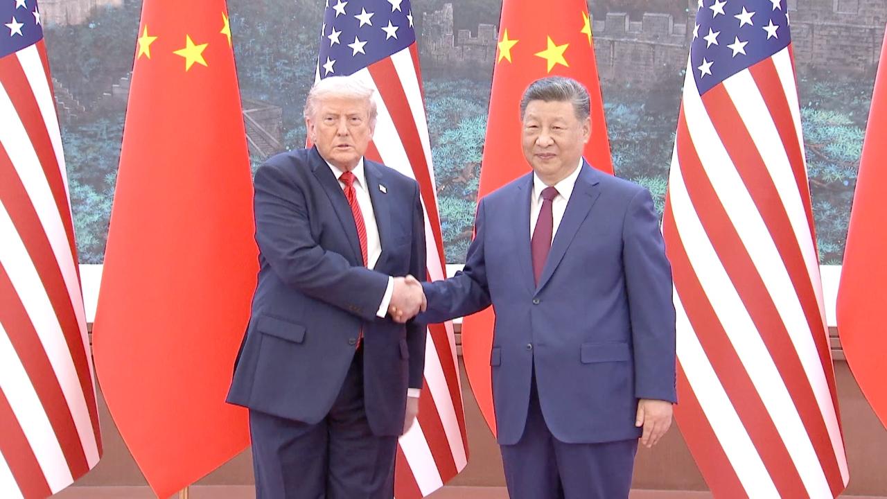Xi Jinping, Donald Trump shake hands and pose for photo in Beijing - CGTN