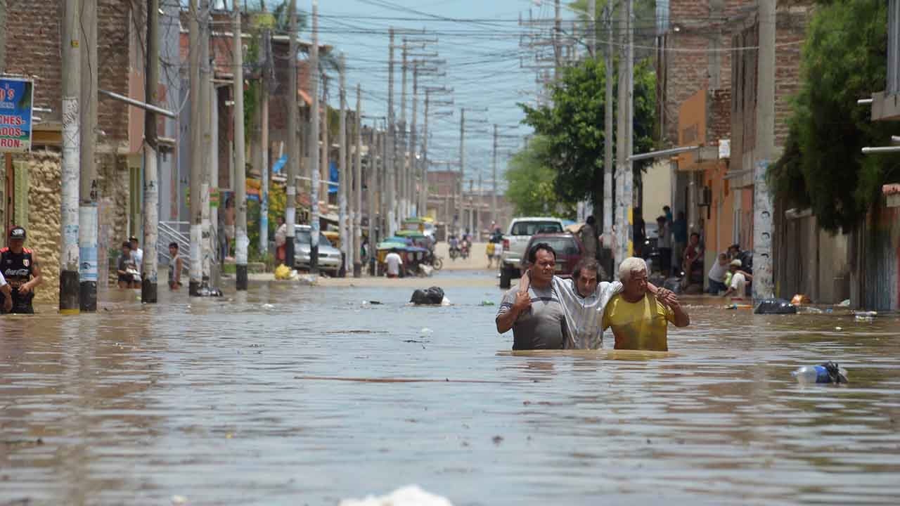Four killed as Peru river bursts its banks amid floods - CGTN