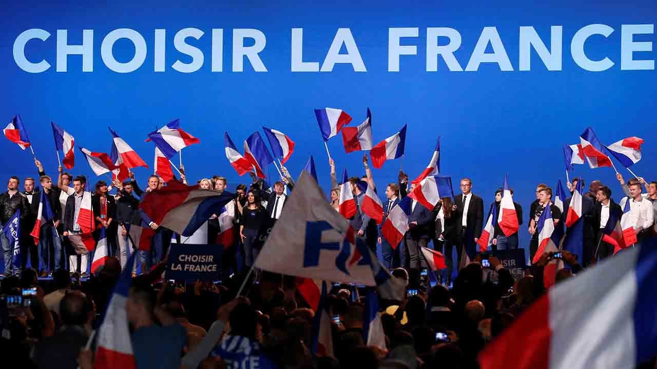 Macron and Le Pen exchange May Day blows across Paris - CGTN