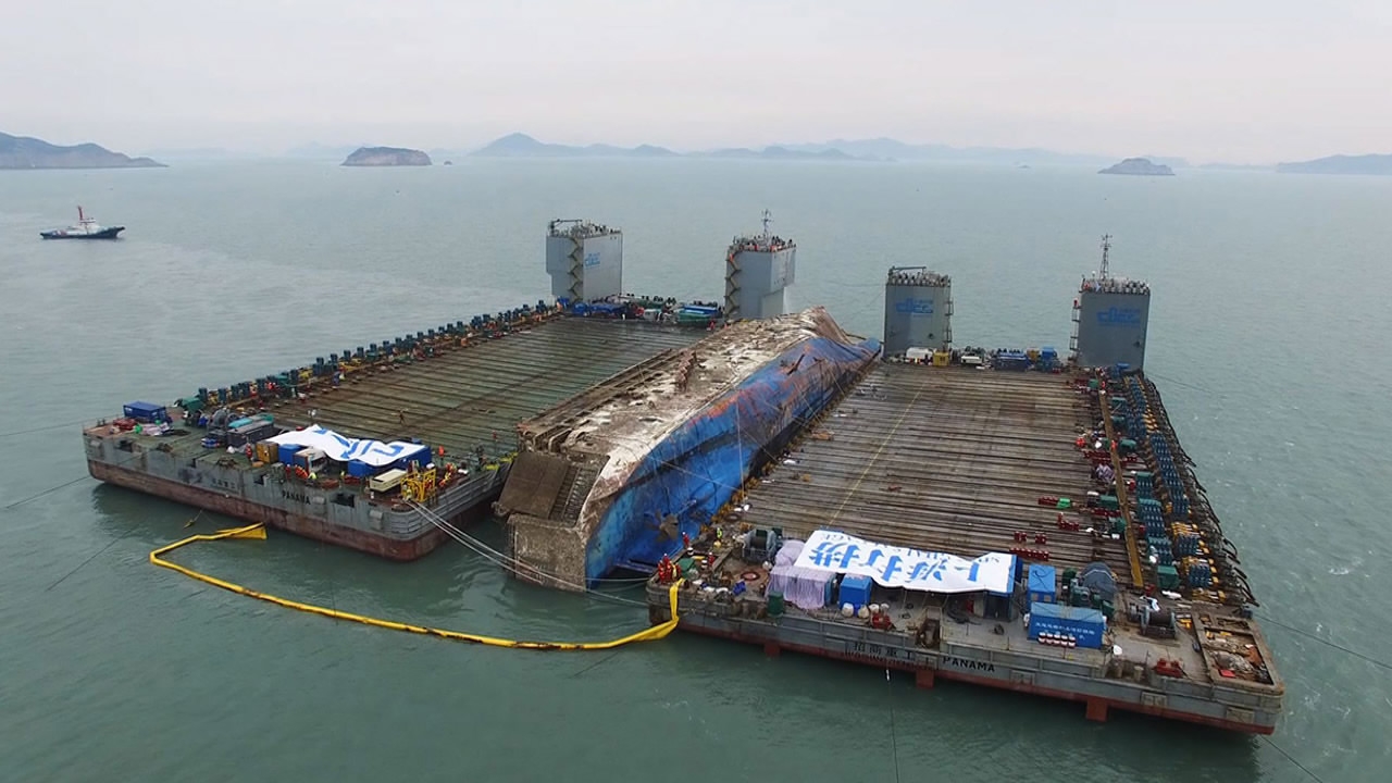 Sewol ferry lifted to target height as salvage operation races against ...