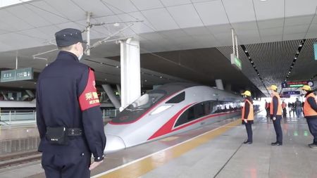 The first train arrives at Wuhan station with 240 returnees - CGTN