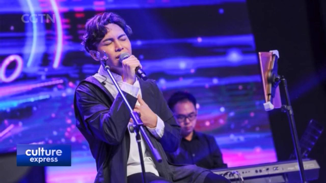 Singing Splash: Song's attention transforms Malay singer's life - CGTN